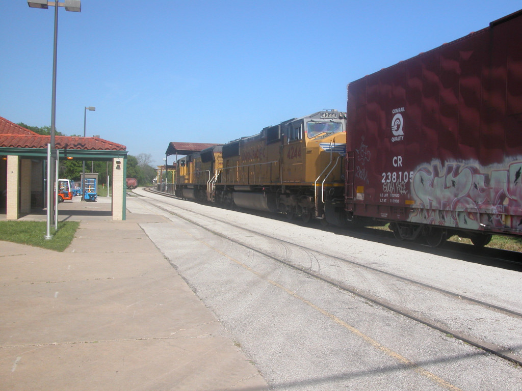 UP 4244 26Mar2012 NB with mixed merchandise rolling through the AmTrak Station